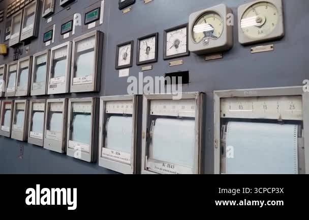 Control panel with buttons and indicators at an old power plant ...