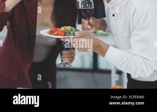 young people eating food in modern office Stock Video Footage - Alamy