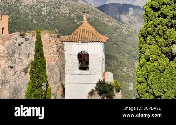 A stunningly beautiful bell tower stands majestically, framed by an ...