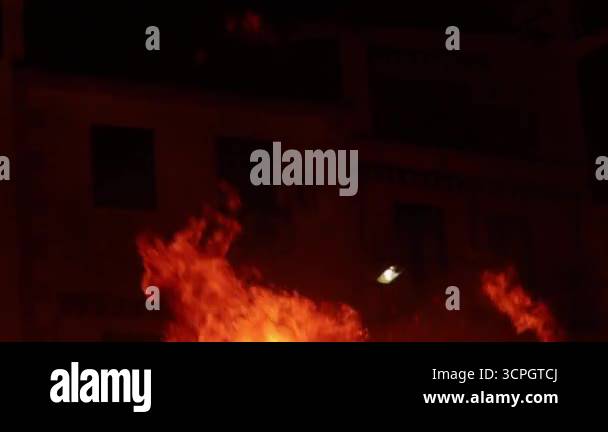 Close up of fire in street at night Stock Video Footage - Alamy