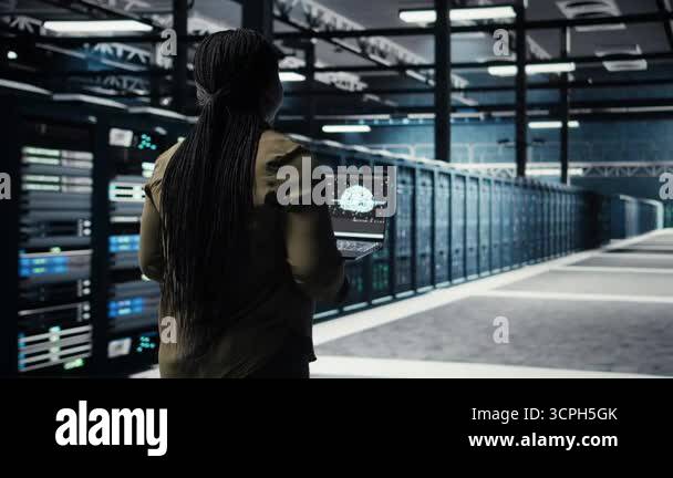 Programmer doing data center automation using AI software tools, enhancing workflow. Server room ...