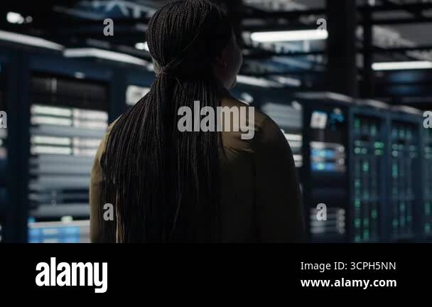 Data center manager conducts security audits to protect against cyber threats and errors ...