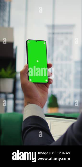 Vertical Video Strategic CEO in a global corporate setting holds mockup ...