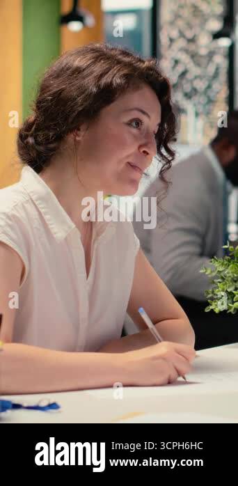 Vertical Video Professional candidate fills out onboarding documents ...