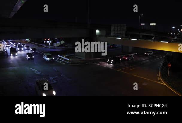 A night cityscape of traffic jam under the city overpass in Tokyo. High ...