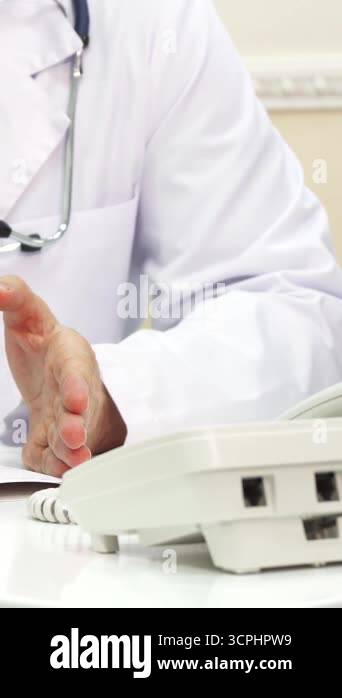 In a warm and inviting doctors office, a dedicated doctor attentively ...