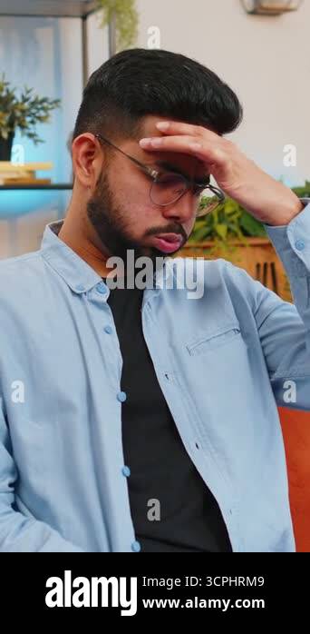 Sick Indian man rubbing temples to cure headache problem, suffering ...