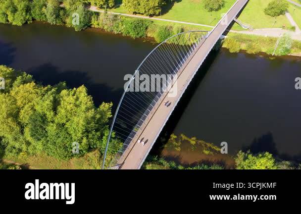 Static aerial drone footage of the famous Millennium Bridge which is a ...