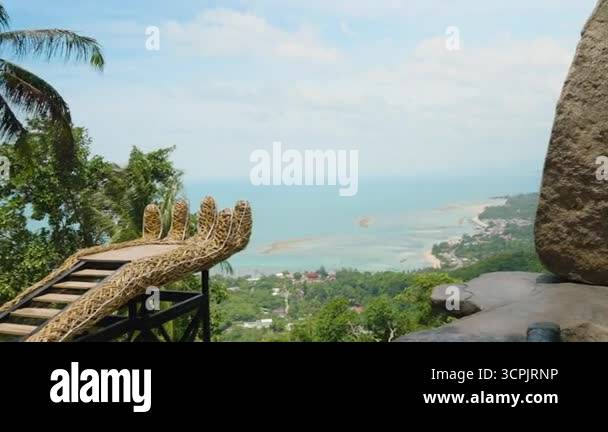 Large Overlap Stone Beside Giant Hand Platform Overlooking Blue Ocean ...