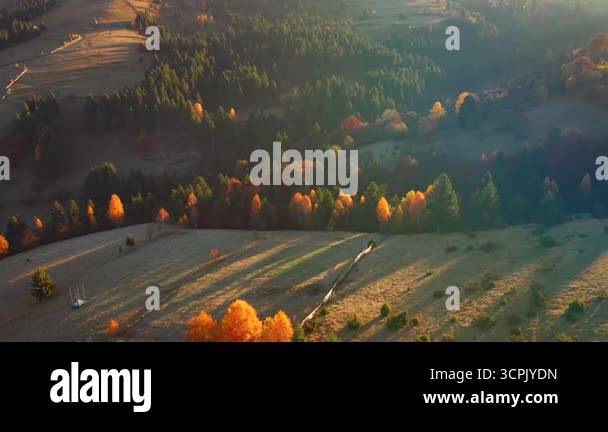 Autumn scene of a rolling hills in morning light. Filmed in 4k, drone ...