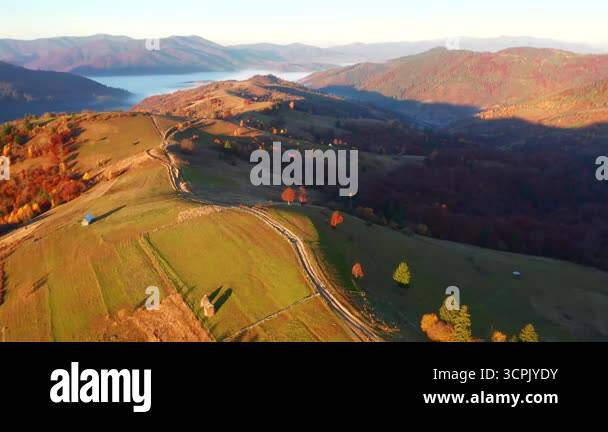 Splendid autumn scene of a rolling hills in morning light. Filmed in 4k ...