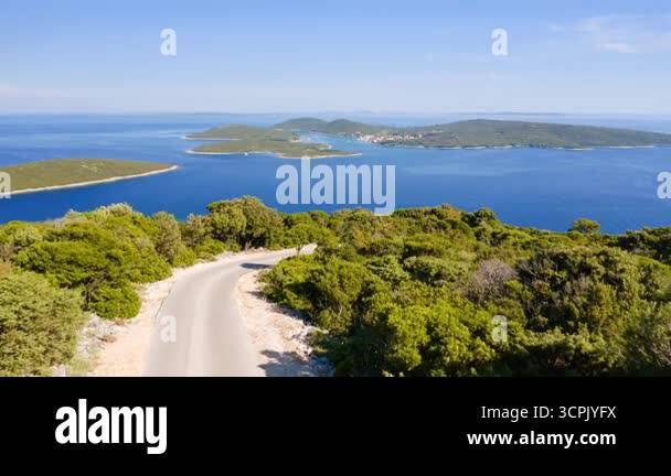 Spectacular view of small Ilovik island from Losinj island. Filmed in ...