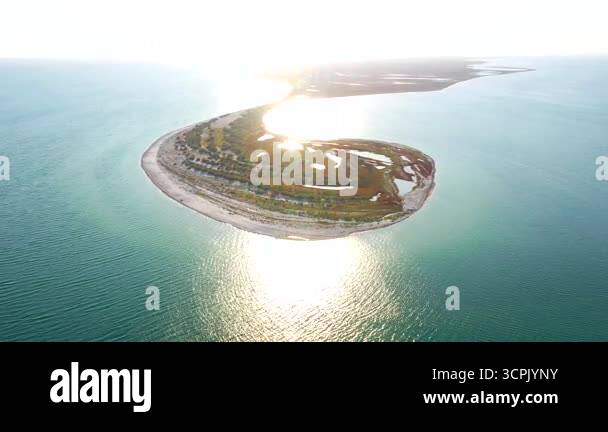Great view of the island of unique shape from a bird's eye view. Filmed ...