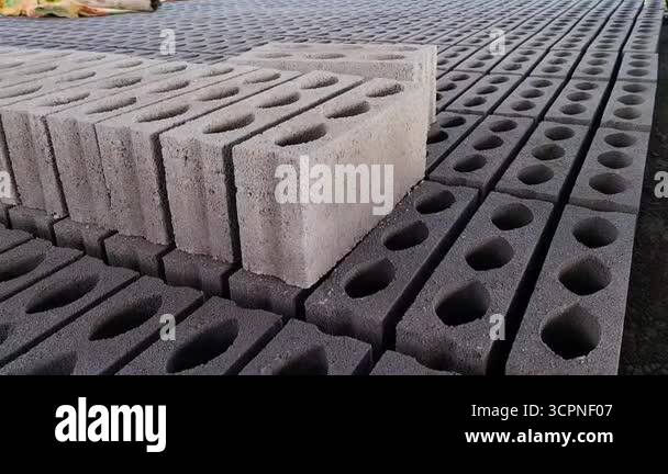 Closeup view of bricks for making houses, new bricks are a mixture of ...