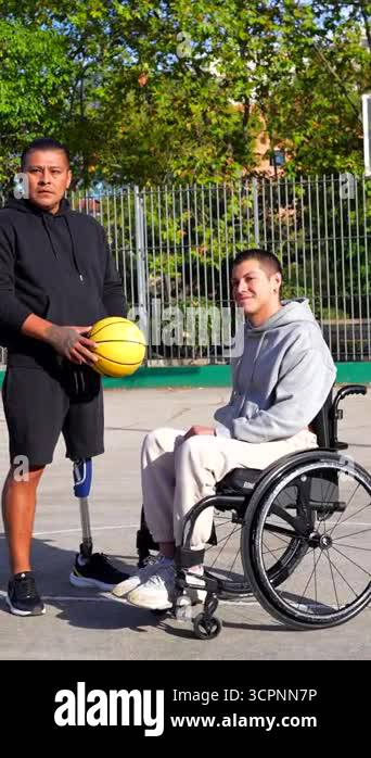 Two people with disabilities, one with a prosthetic leg and the other ...