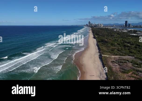 4K aerial drone footage showing Wave Break Island, golden sandy beaches ...