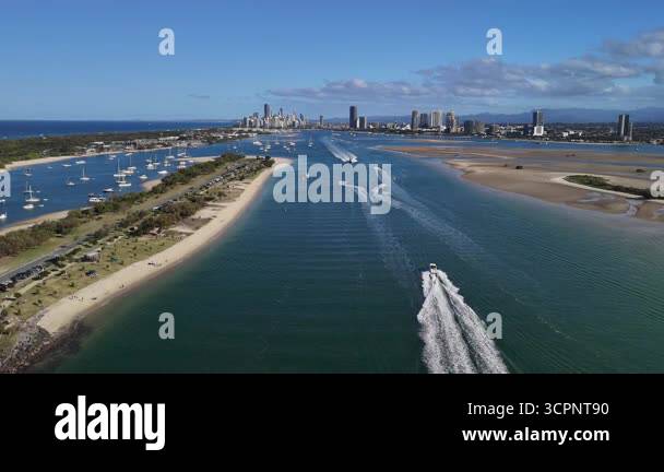 4K aerial drone footage showing Wave Break Island, golden sandy beaches ...