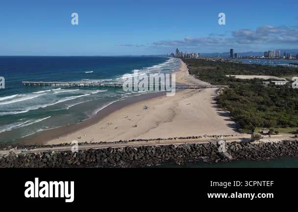 4K aerial drone footage showing Wave Break Island, golden sandy beaches ...