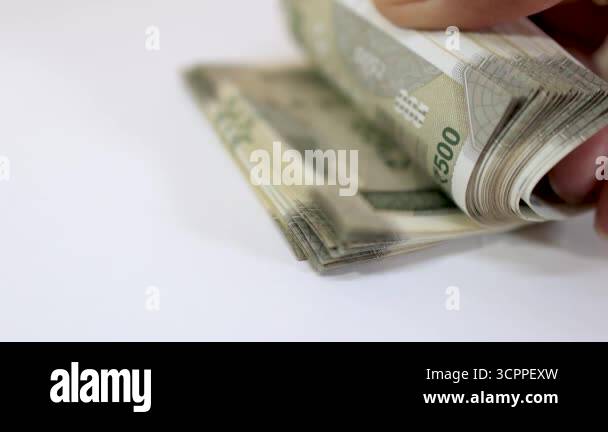 Close up view of flipping Indian 500 rupees pack, Budget concept Stock ...