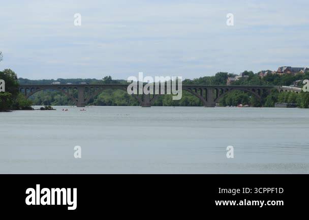 Key Bridge and the Potomac River in Washington D.C.. Kayakers are seen ...