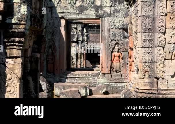 Close up view of historic rock carved statues at Angkor wat temple ...