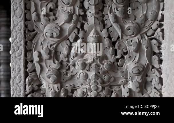 Close up view of historic rock carved statues at Angkor wat temple ...