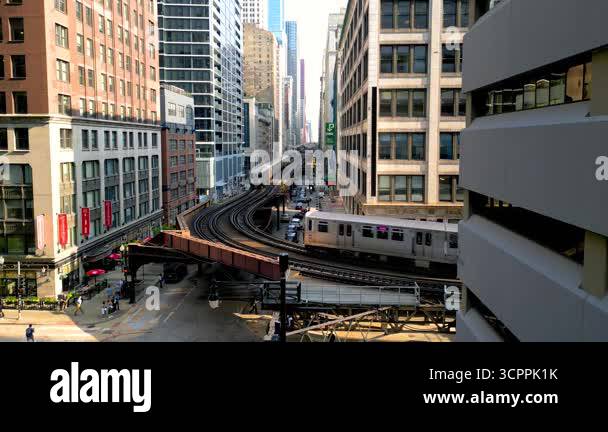 Chicago, Illinois, USA -19 JUN 2023 : Aerial view of local metro trains ...