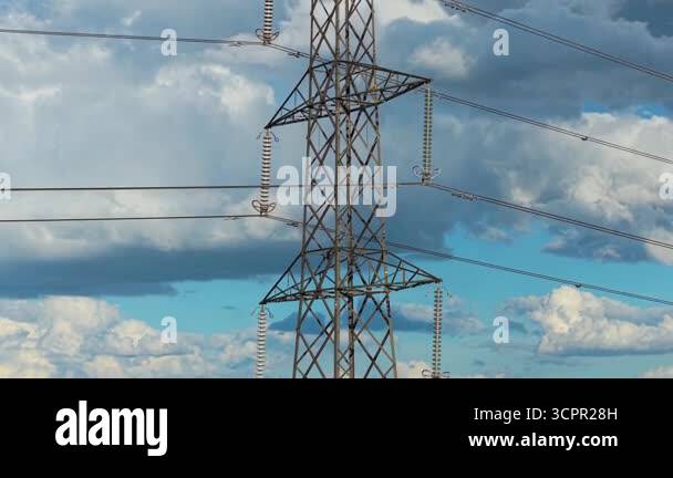 High voltage tower section showing insulators transmitting electricity ...