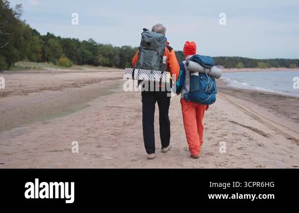 Hiking tourism adventure. Senior couple man woman enjoying outdoor ...