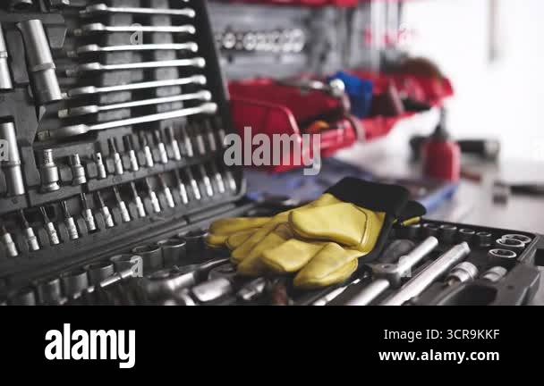 Mechanics Workbench With Tools, Wrenches, And Gloves In The Auto Repair ...