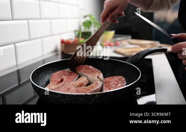 Salmon, A Red Fish Rich In Vitamins And Omega, Frying In A Pan On The ...