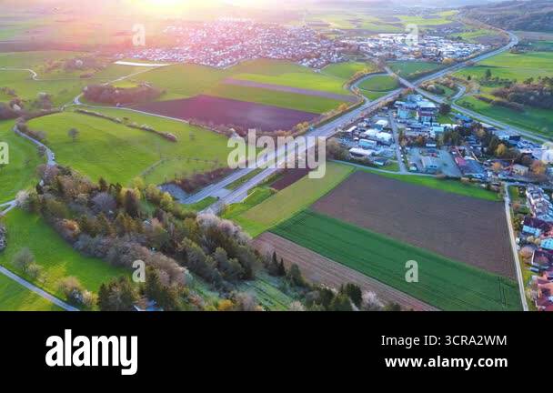 Small rural European town with highways and roads, agricultural fields ...