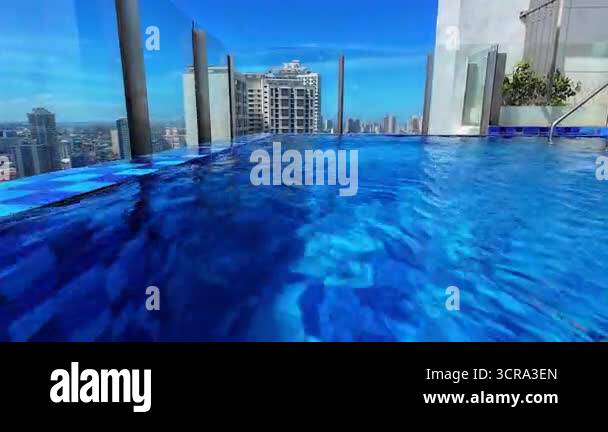 View point from a pool overlooking Manila Makati district in the ...