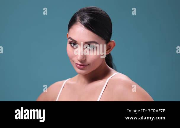 A close-up of a fashion model's face, showcasing her flawless features ...