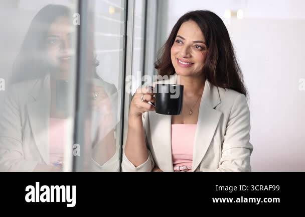 Woman sips coffee reflecting in Stock Videos & Footage - HD and 4K ...