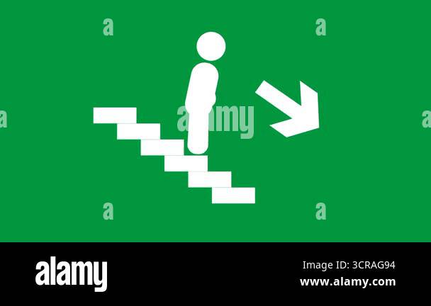 A green emergency sign showing a person walking downstairs to indicate ...