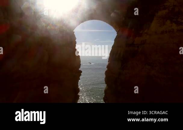 Small motorboat cough through iconic the Praia dos Estudantes Roman ...