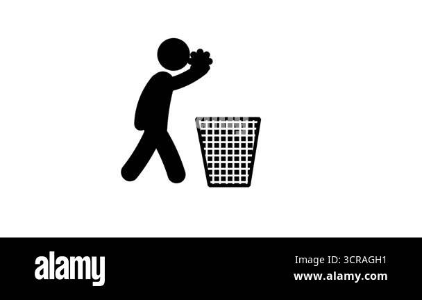 A person throws garbage into a trash bin, highlighting cleanliness ...