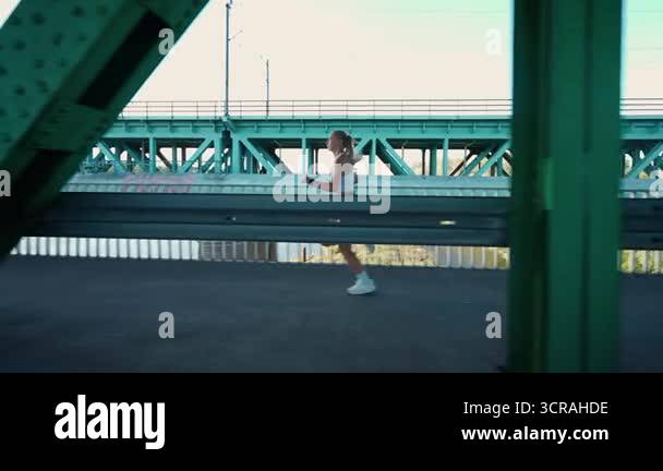 Warsaw, Poland - September 20, 2025: Morning jog, pretty woman running ...