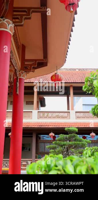 Scenic asian temple courtyard with red lanterns and traditional ...