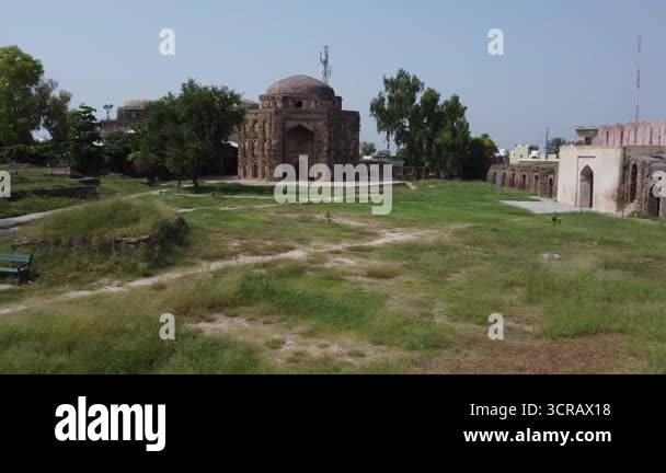 Slow aerial shot of Rawat Fort Pakistan showing historic Mughal ...