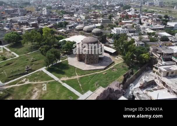 Circle aerial view of historic Rawat Fort Pakistan showing Mughal heritage site now completely ...