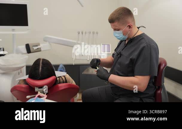 Dental procedure performed in a modern clinic using advanced methods and tools Stock Video ...