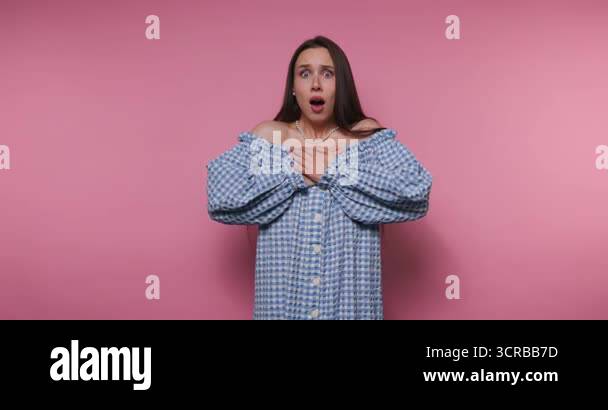 footage of young woman displays a genuine look of surprise and shock ...