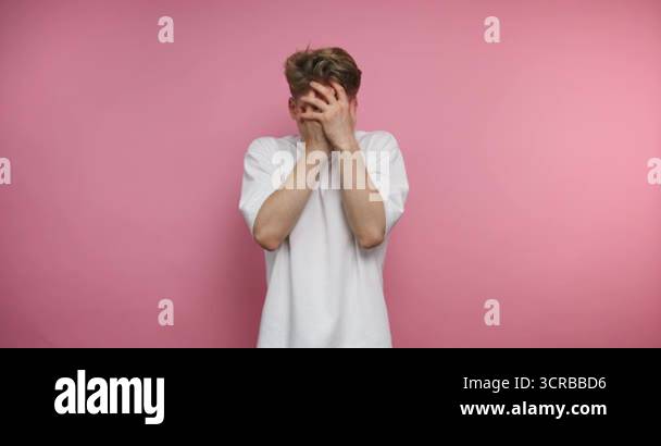 A person shows various emotions through expressive gestures and facial ...