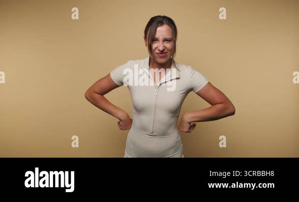 A woman demonstrates various emotions through her facial expressions ...