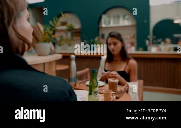 Lively cafe scene two women Stock Videos & Footage - HD and 4K Video ...