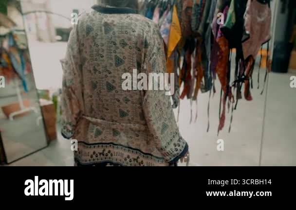 A fashionable and trendy model showcases stylish and chic clothing ...