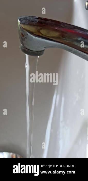 Water faucet at a restaurant sink, clean and functional, used for ...