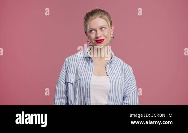 Gorgeous american woman with red lips showing yes signal, nods head ...